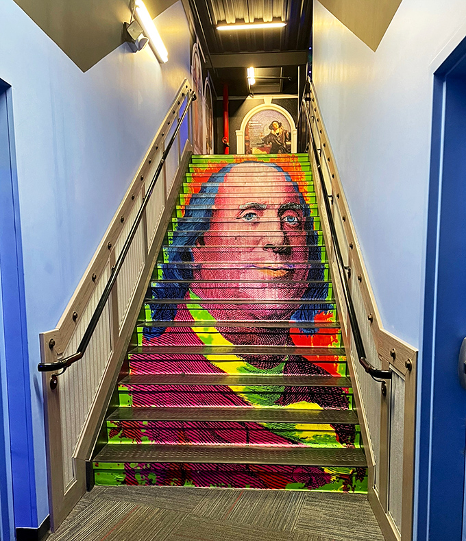 Benjamin Franklin watches over these psychedelic stairs, proving that even Founding Fathers look cooler with a splash of neon color.