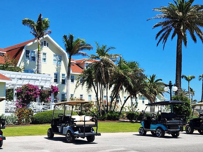 The historic Gasparilla Inn stands as a testament to old Florida elegance, where rocking chairs on the porch invite unhurried conversation.