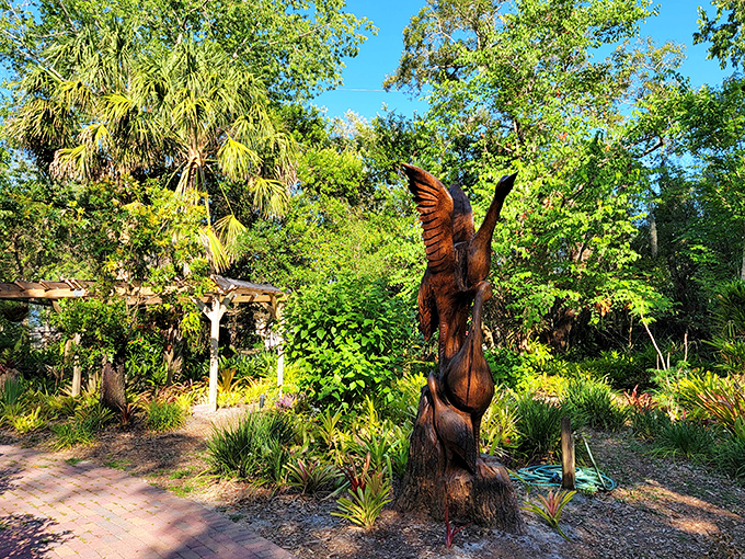 This soaring eagle sculpture emerges from wood, capturing the spirit of freedom that permeates this natural sanctuary away from Florida's tourist crowds.