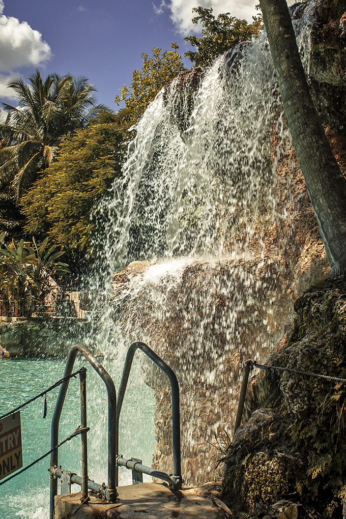 Water doesn't just fall here &ndash; it performs, cascading over ancient coral rock in a never-ending show that's been running since Calvin Coolidge was president.