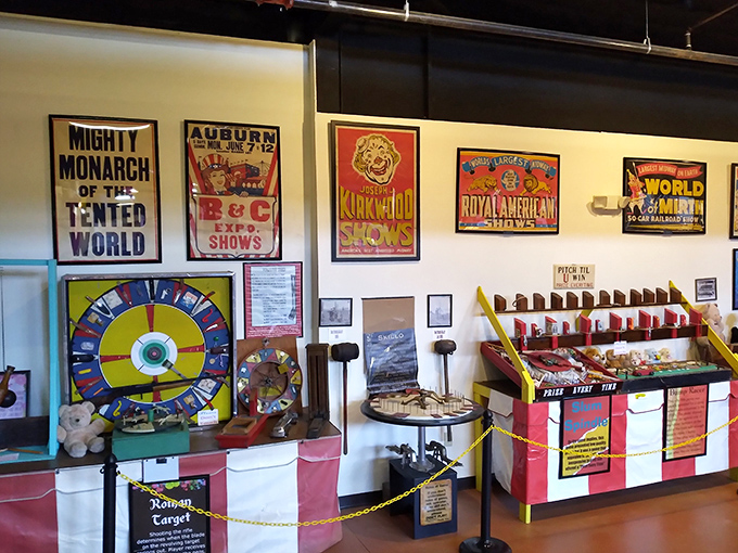 Authentic carnival artifacts and circus memorabilia line the walls, preserving the visual culture of America's traveling entertainment history.