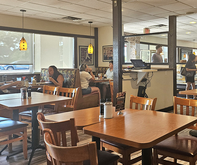 Where strangers become neighbors over coffee refills and home fries. The morning light streaming through windows adds that perfect golden-hour glow to breakfast conversations.
