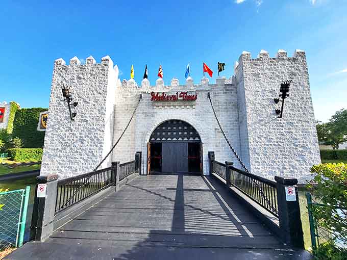 The drawbridge entrance creates immediate immersion &ndash; crossing from modern Florida into a world where chivalry reigns and dinner requires no forks.