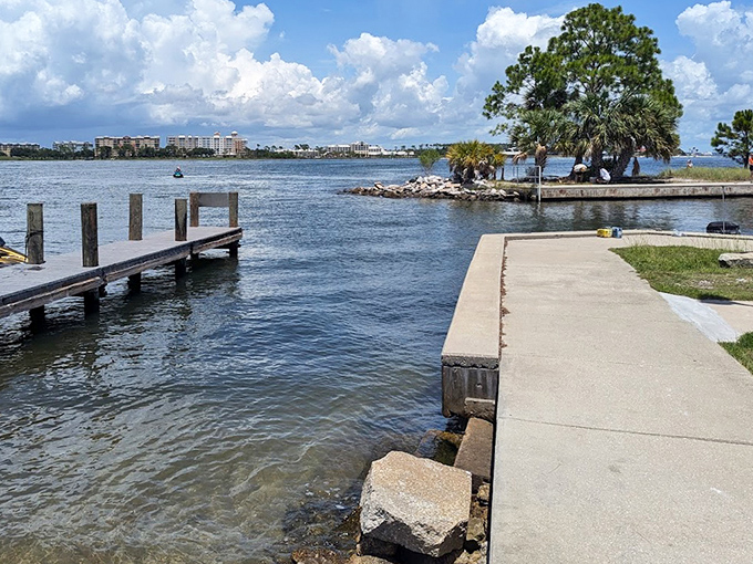 A weathered bench offers contemplative moments overlooking the bay, where thoughts can drift as freely as the clouds above.