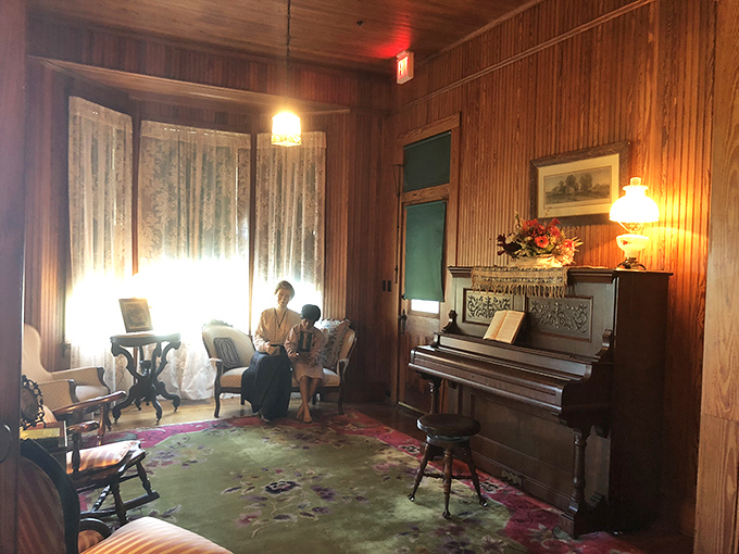 This cozy sitting area whispers of afternoons spent with books and conversation, when entertainment didn't require charging cables or WiFi passwords.