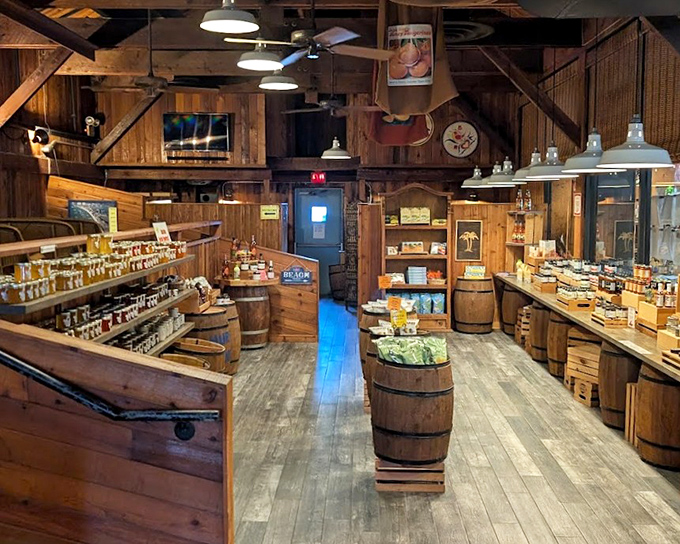 Inside view: Rustic barrel displays and wooden shelving create a warm, unpretentious atmosphere perfect for discovering new flavor experiences.