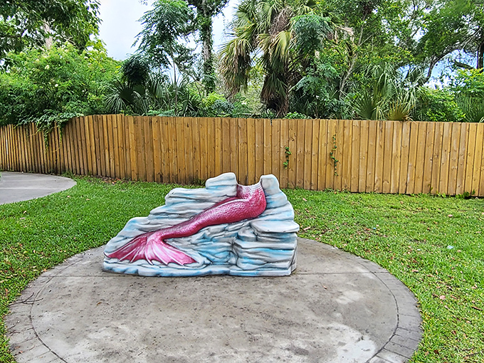 "Just waiting for the rest of me to arrive!" This playful mermaid tail sculpture invites visitors to capture their own mythical transformation.