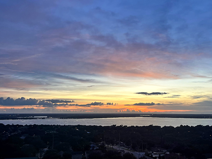 Sunset transforms the landscape into a painter's palette of oranges and purples, proving Mother Nature still puts on Florida's best show.