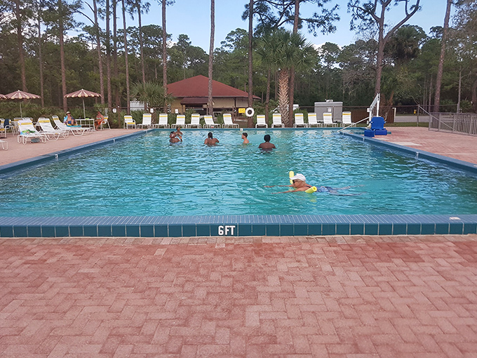 Crystal-clear waters invite swimmers to cool off in this perfectly sized pool &ndash; large enough for fun, small enough for parents to relax.