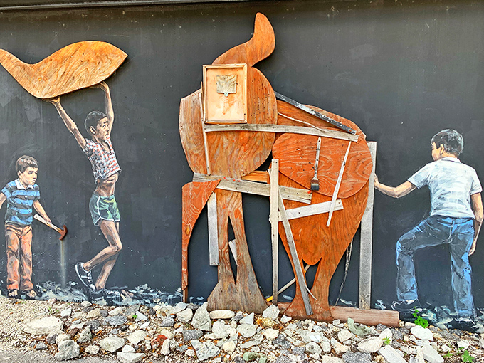 This wooden installation tells a story of childhood imagination, where ordinary materials transform into extraordinary adventures through creative play.