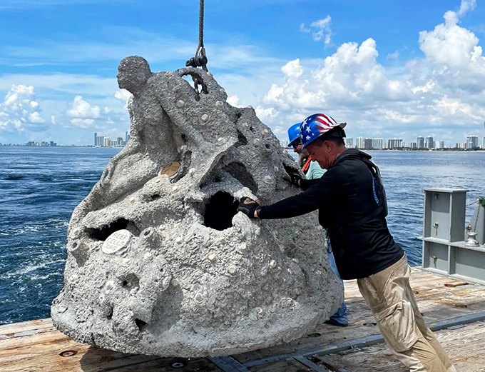 Behind every reef is a dedicated team &ndash; these workers prepare to send another sculpture to its underwater destiny.