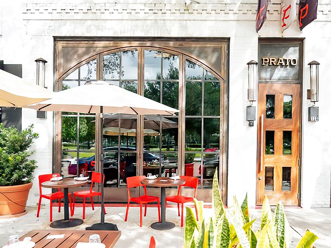 Prato's striking modern entrance and outdoor seating area exemplify Winter Park's contemporary dining scene, where design matters as much as cuisine.