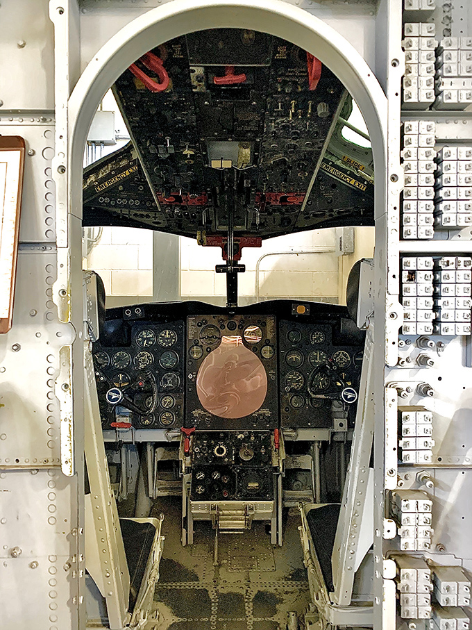 Peer into this meticulously preserved cockpit and imagine the pilot's view &ndash; dozens of gauges and switches that required constant attention during flight.