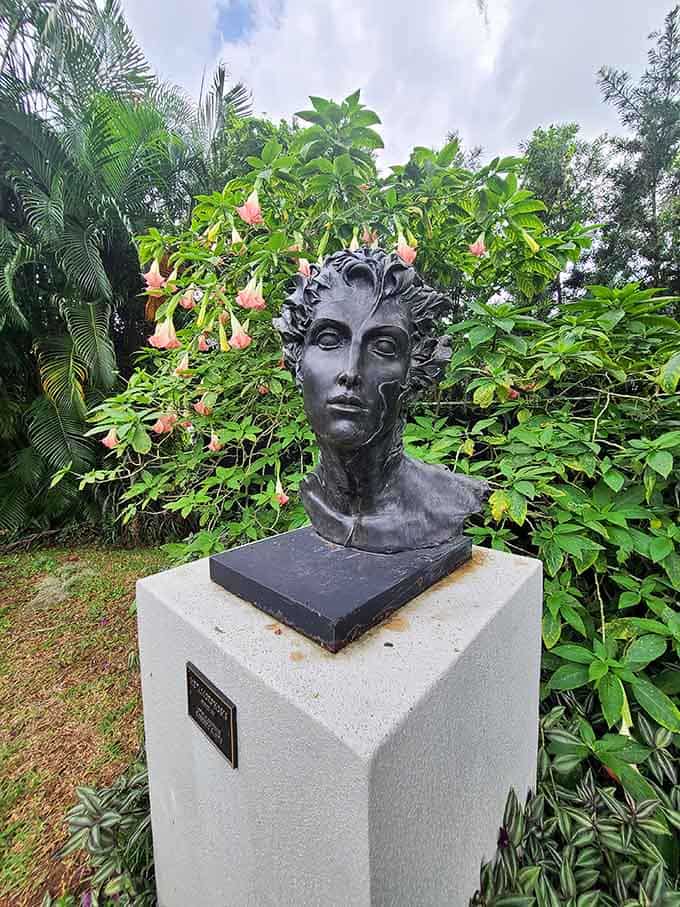 This striking bronze portrait captures a moment of quiet intensity, like someone just told her something absolutely fascinating.