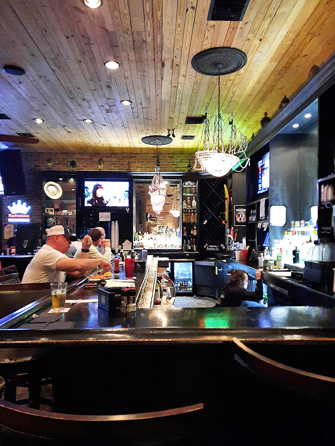 Another angle of the inviting bar where locals and tourists mingle over craft beers and cocktails.