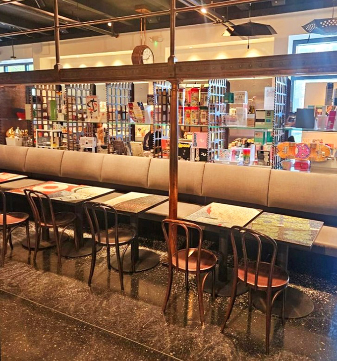 The caf&eacute; doesn't just serve refreshments &ndash; it continues the design story, with every detail from lighting to furniture carefully chosen to enhance the experience.