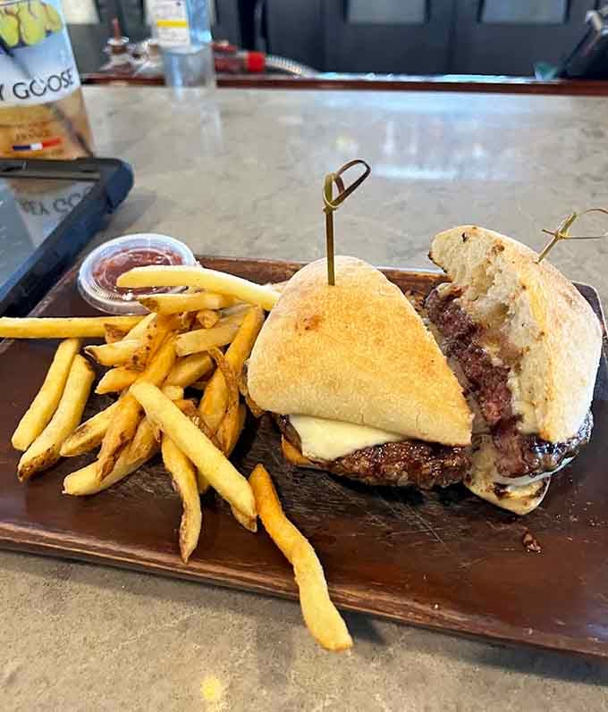 This steak sandwich means business, the kind that requires napkins and delivers satisfaction with every messy, delicious bite.