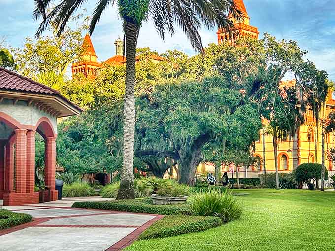 The meticulously maintained campus lawn provides a lush green carpet worthy of the architectural royalty that surrounds it.