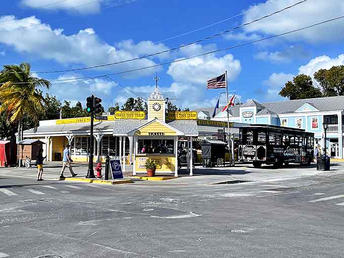 The cheerful yellow ticket booth stands ready, the gateway to your 90-minute journey through paradise.