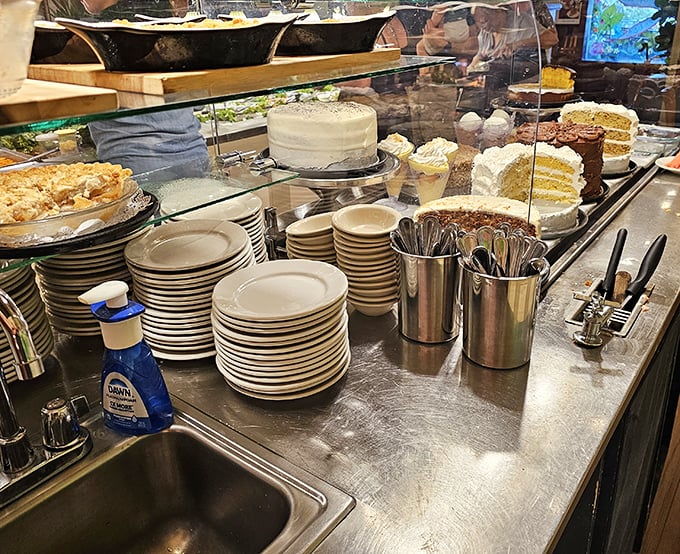 The dessert station stands ready for service, with stacks of plates awaiting their sweet destiny &ndash; the hardest decision you'll make all day.