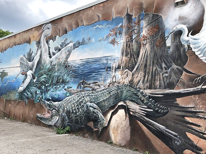 Prehistoric Florida emerges from the wall in this jaw-dropping alligator scene, where swamp meets art in spectacular fashion.