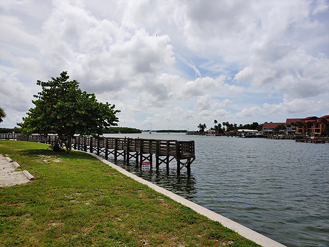 The fishing pier extends like a welcome handshake into the bay, promising peaceful hours and maybe dinner if luck is on your side.