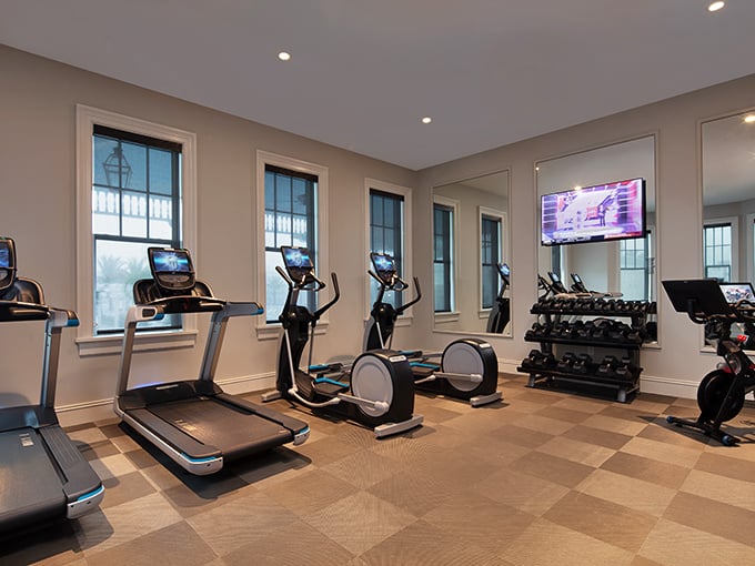 The fitness room proves that even working out can be elegant when done in a space flooded with natural light.