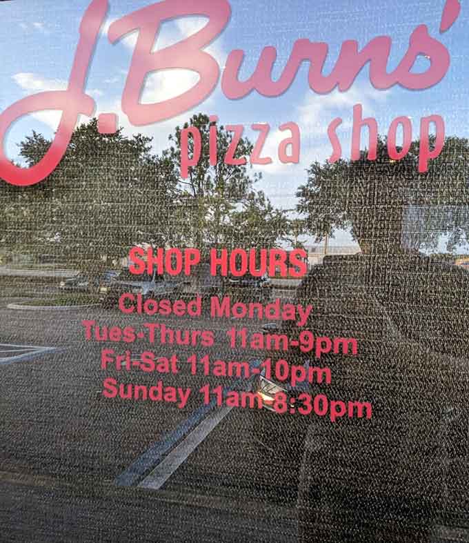 The hours posted on the window ensure you'll never show up to find disappointment instead of pizza.