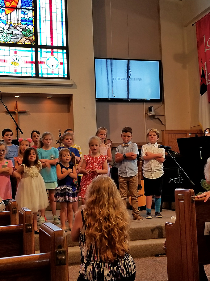 The children's choir brings youthful energy to worship services, their voices filling the sanctuary with innocent joy.