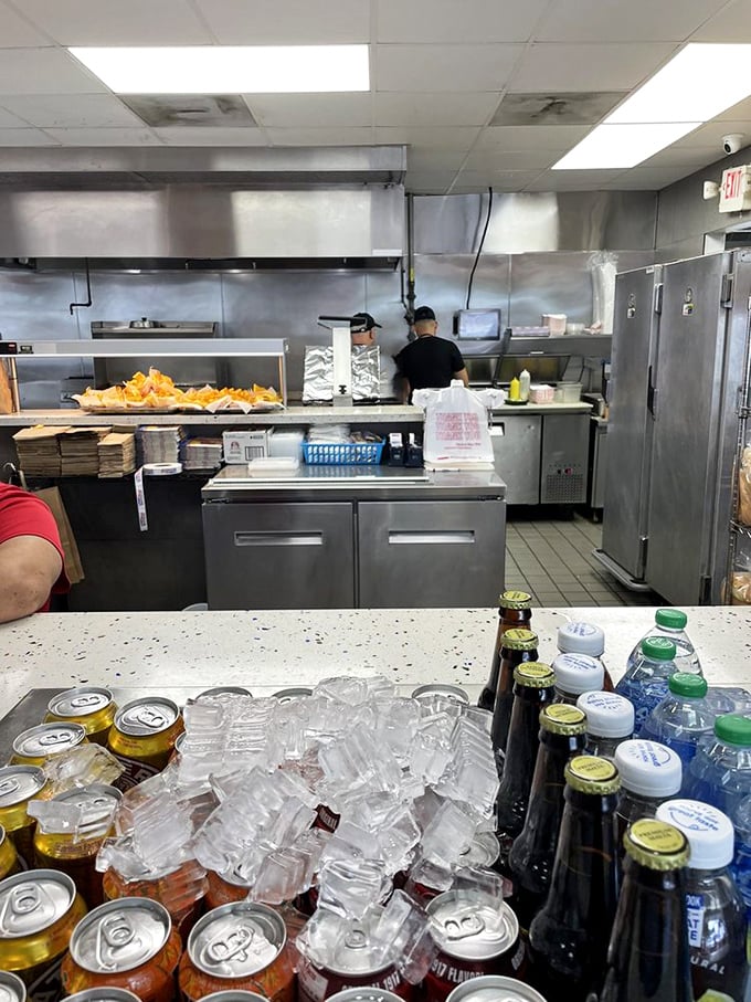 The engine room of flavor! Glimpse into the kitchen where culinary magic happens daily, with fresh ingredients transformed into Miami's most craveable Cuban creations.