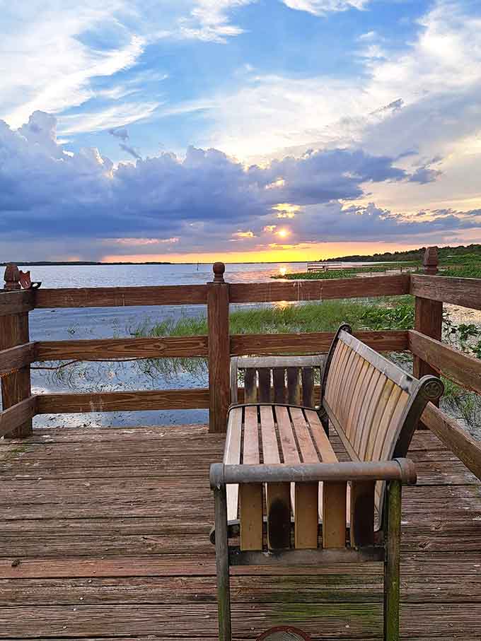 A simple bench on a wooden pier becomes the best seat in the house when the show includes sunset colors that look Photoshopped but are gloriously, impossibly real.
