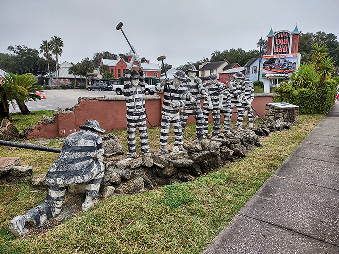 The prison yard welcoming committee! These life-sized prisoner statues show the glamorous fashion of chain gang couture, striped uniforms never go out of style.