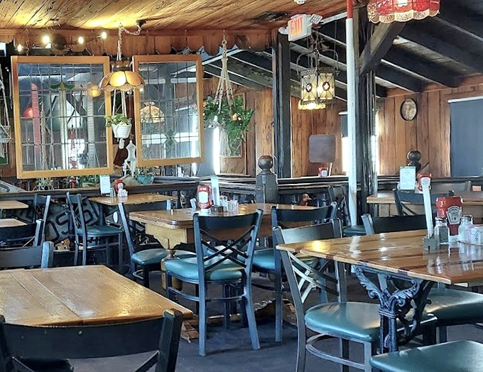 The dining room's rustic charm comes from decades of history absorbed into every wooden beam and vintage fixture.