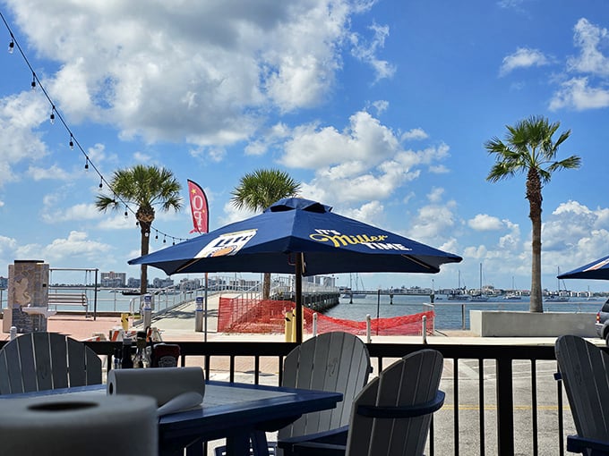 Outdoor Patio: Where the boundary between restaurant and paradise blurs &ndash; palm trees sway, water sparkles, and everyday worries seem impossibly distant.
