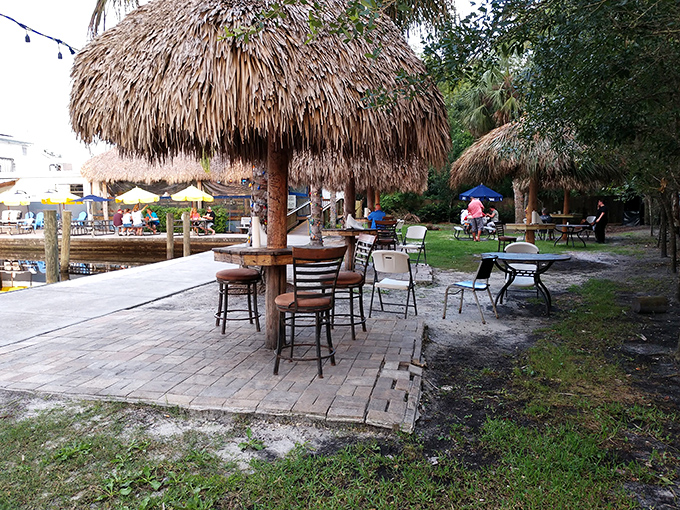 Thatched tiki huts and simple tables create the perfect setting for watching boats drift by while cracking into fresh seafood.