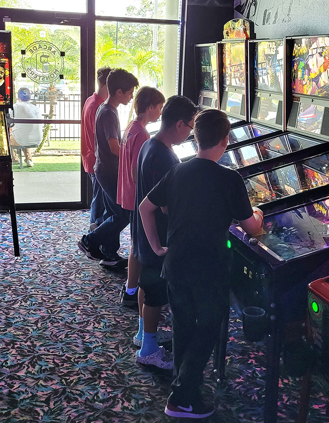 Pinball wizards in training: Where the tactile joy of flippers and bumpers creates a new generation of enthusiasts. No screen can replace this feeling.