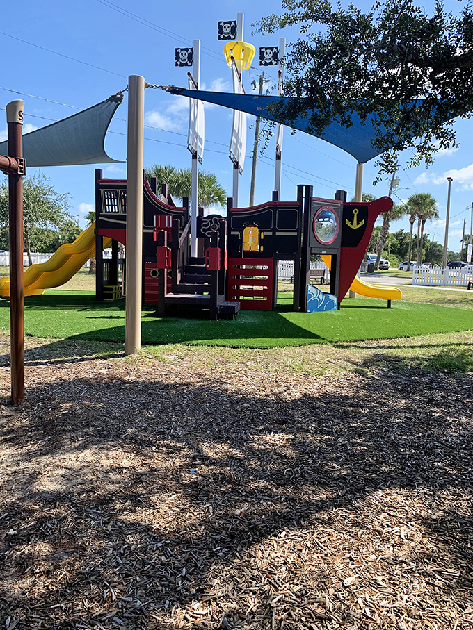 The pirate ship playground delights younger visitors, sparking imaginations while parents catch their breath after the lighthouse climb.