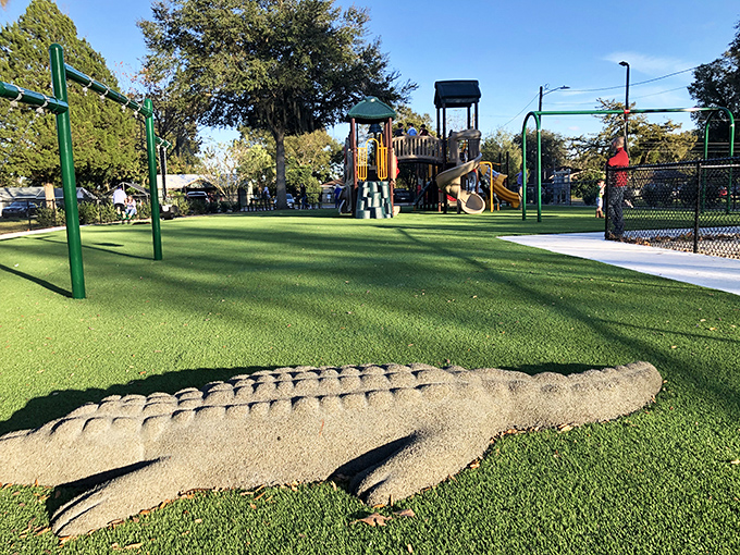 The playground's whimsical alligator sculpture reminds visitors they're definitely in Florida, where even the play areas have a sense of humor.