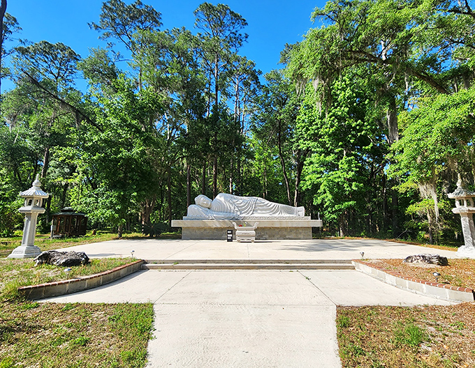 The reclining Buddha statue represents the historical Buddha's passage into Nirvana, its peaceful expression capturing a profound spiritual moment.