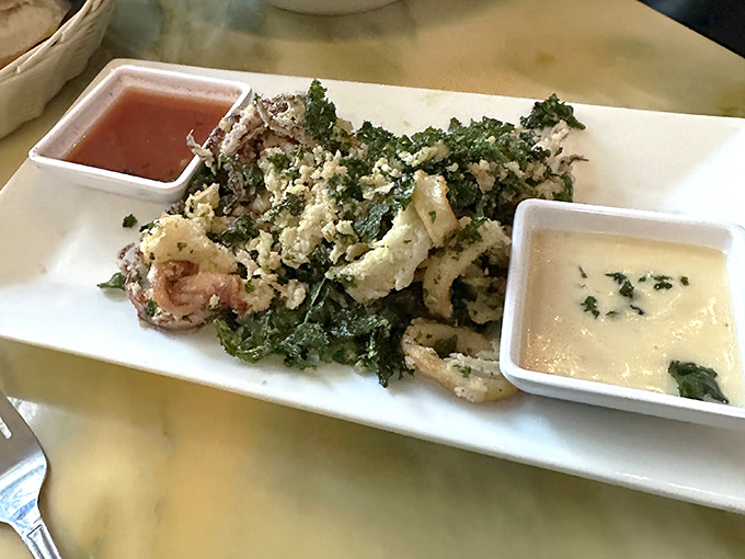 Restaurant Food: Culinary artistry meets fresh Florida bounty on this plate – herbs dancing with seafood in a dish that tastes like sunshine and vacation freedom.