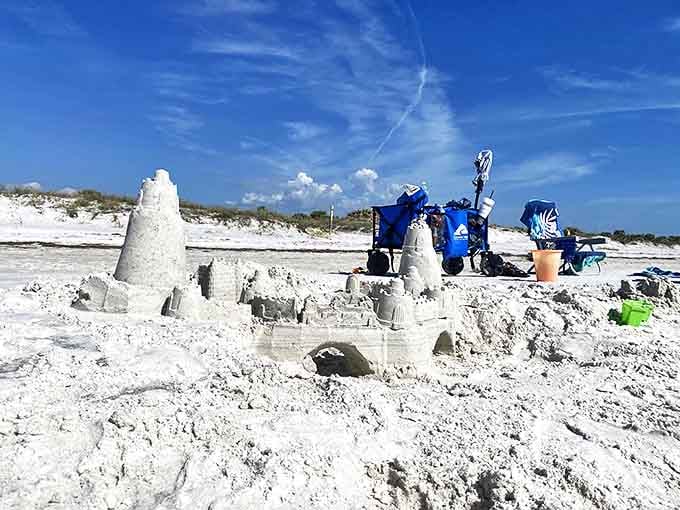 Architectural ambition: A sandcastle rises from Caladesi's sugar-white shores, temporary art that will return to the sea with the next tide.