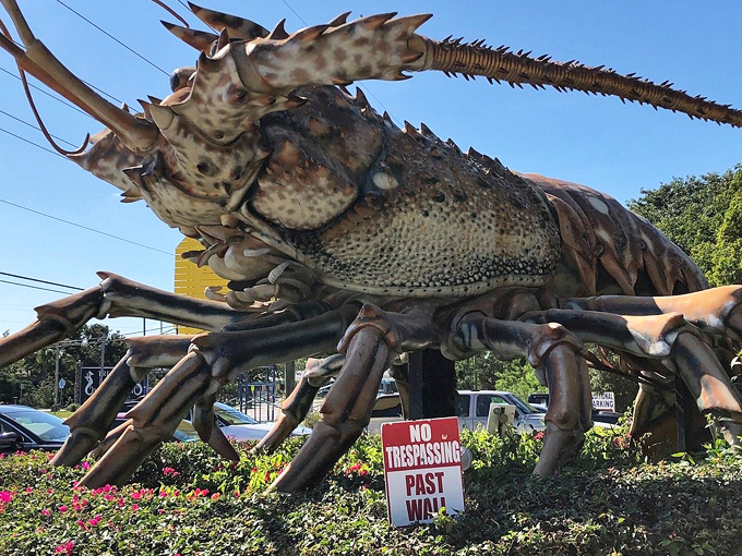 Lobster's Side view: The "No Trespassing" sign seems almost comical &ndash; as if anyone could mistake this massive sculpture for an actual restricted area.