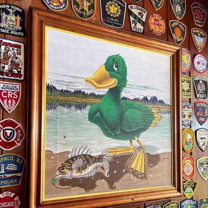 Wall decorations include police patches from across America, creating a quirky patchwork that somehow makes perfect sense in this welcoming space.