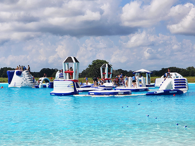 Inflatable obstacles transform the tranquil lagoon into an action-packed playground where dignity is optional but laughter is mandatory.
