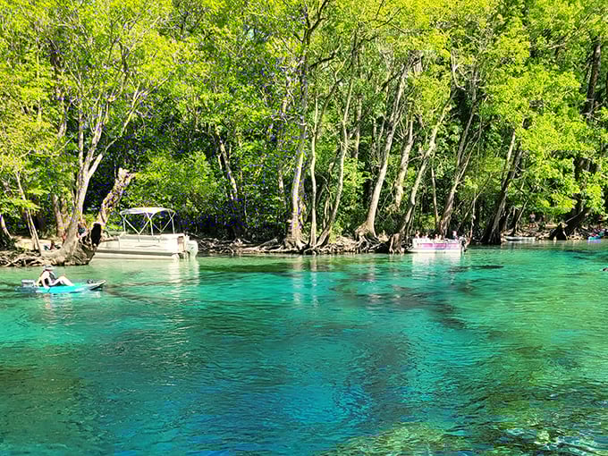 Boats waiting patiently at the launch point, like tickets to a natural water park that puts man-made attractions to shame.
