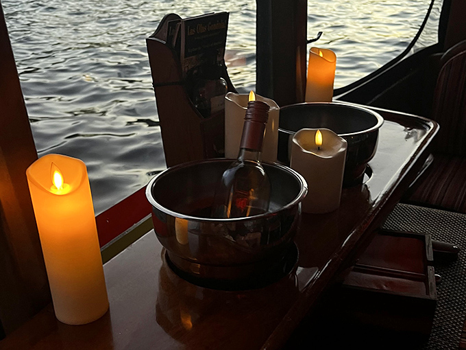 Candlelight and champagne create an atmosphere of romance that turns an evening cruise into an unforgettable experience.