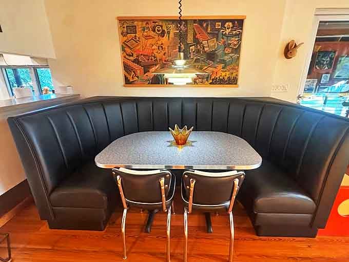 This retro dining nook wouldn't look out of place in a 1950s diner, proving that shipping containers can time-travel when properly decorated.