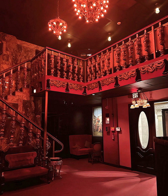 Rich crimson walls and ornate staircases transport diners to another era, when dining out was an occasion worthy of your finest attire.