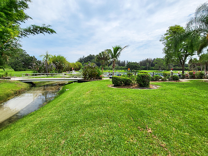 Meticulously maintained grounds invite leisurely strolls, with native plants creating a quintessential Florida landscape experience.