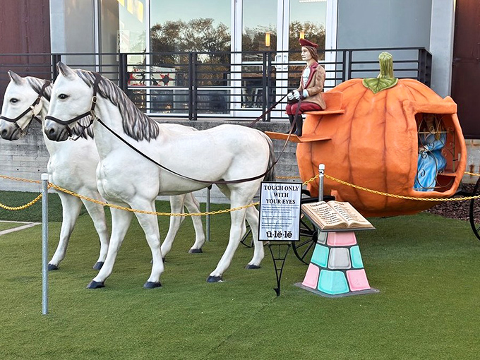 Cinderella's pumpkin carriage and white horses stand ready outside Ulele, as if waiting to whisk diners away after their magical meal.